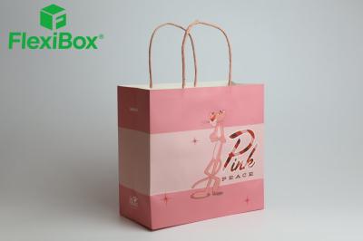 China Pink Paper Shopping Bag with Custom Brand Printing and Durable Handles for Lightweight Packaging for sale