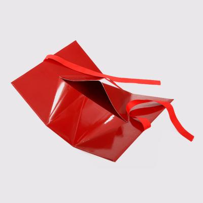 中国 普及した毛のかつら箱は商標の包装の注文のロゴの折り畳み式の束の毛延長包装箱を編む 販売のため