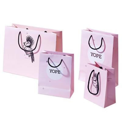 Cina Borsa di spedizione d'imballaggio della carta da stampa del boutique del regalo di acquisto popolare rosa su ordinazione della borsa per l'abito dell'abbigliamento in vendita