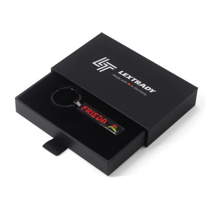 Cina Logo su ordinazione stampato facendo scorrere il contenitore di regalo d'imballaggio a catena chiave del cassetto per la catena chiave in vendita