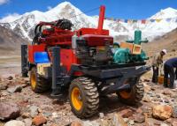 China Low Fuel Consumption Trailer Mounted Drilling Rig Well Drilling Machine for sale