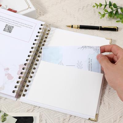 China Spiral Binding Paper Hardcover Notebook Printing A4 A5 Diary Journal Organizer Planner for sale