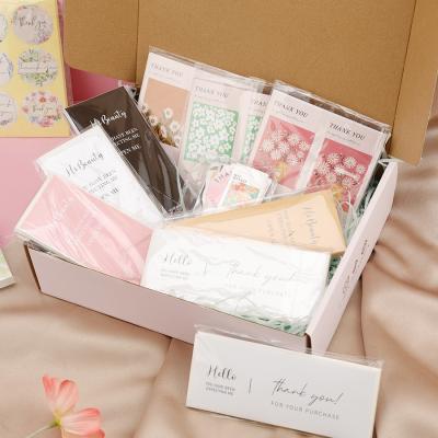 China Custom Logo Printed Flat Pack Corrugated Die Cut Folding Kraft Mailer Shipping Mailing Box for sale