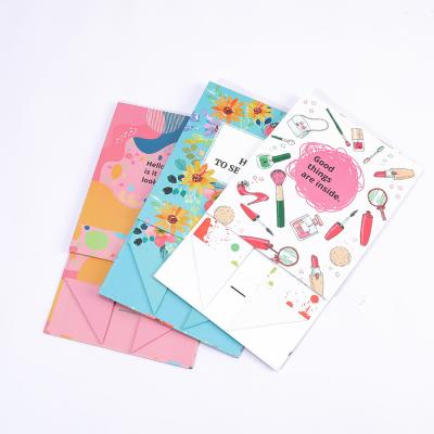 China Custom Design Printing Foldable Luxury Magnetic Closure Gift Box With Ribbon Custom Logo for sale