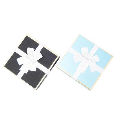 China Custom Order Recyclable Candle Foldable Packaging Paper Lid and Base Gift Boxs with Ribbon for sale