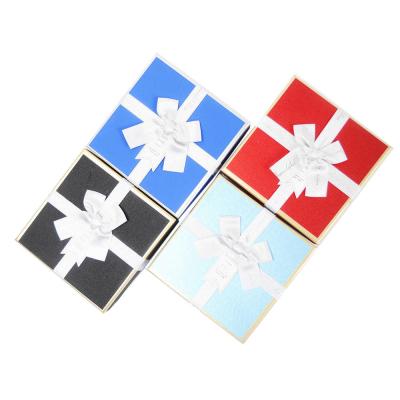 China Custom Order Recyclable Candle Foldable Packaging Paper Lid and Base Gift Boxs with Ribbon for sale