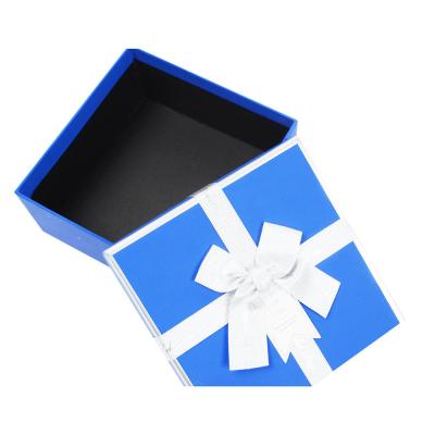 China Custom Order Recyclable Candle Foldable Packaging Paper Lid and Base Gift Boxs with Ribbon for sale