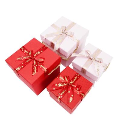 China Custom Logo Card Small Favors Red White Jewelry Gift Box with Ribbon Bow and Handle for sale