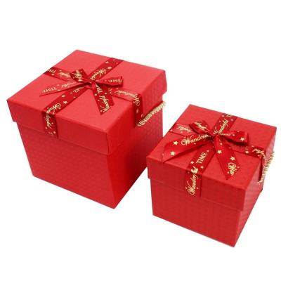 China Custom Order Accepted Eco Friendly White Packaging Box with Ribbon Bow and Handle for sale