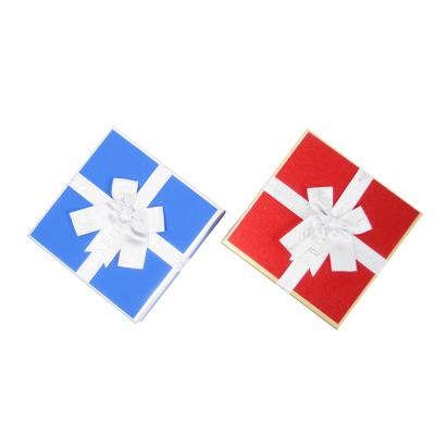 China Custom Logo Colorful CMYK Cardboard Paper Gift Storage Box Packaging with Ribbon Bow for sale