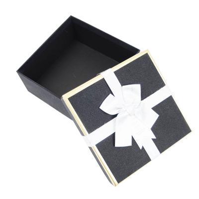 China Custom Logo Colorful CMYK Cardboard Paper Gift Storage Box Packaging with Ribbon Bow for sale