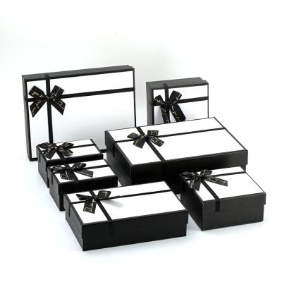 China Customized Die Cut Black White Paper Gift Lid Box With Custom Logo Printing And Ribbon for sale
