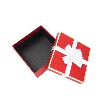 China Customized Die Cut Square Cardboard Jewelry Gift Packaging Paper Box with Ribbon Lid for sale