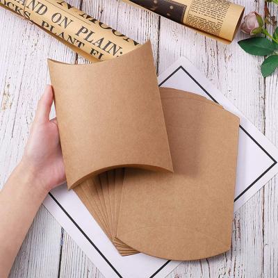China Custom Logo Heavy Duty Kraft Pillow Shape Candy Paper Box for Candy Storage Solution for sale