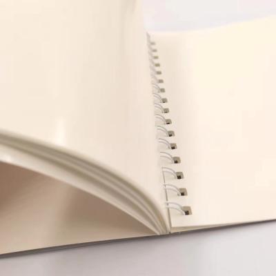 China Custom A5 Softcover Spiral Bound Reusable Sticker Book with 100 Double Sided Pages Silicone Release Paper for sale