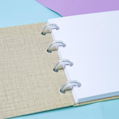 China RINGNOTE A7 Size PU Leather Portable Luxurious High Quality Mini Small Disc Bound Snap Ring Pocket Notepad Notebook with Pen for sale