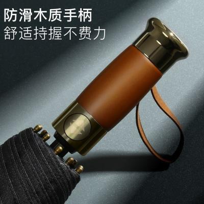 中国 オーダーメイドロゴ 広告 傘 木製柄 3 折りたたみ 太陽と雨傘 販売のため