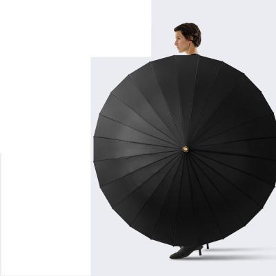 Cina Grande ombrello anti-vento 24k maniglia lunga automatica in stile minimalismo per tempesta di pioggia in vendita