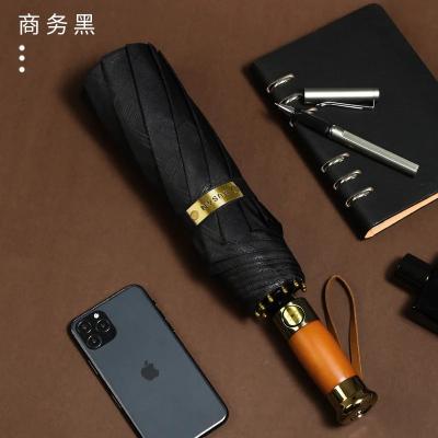 Cina Ombrello pieghevole automatico in legno massello stampato su misura per occasioni di viaggio in vendita