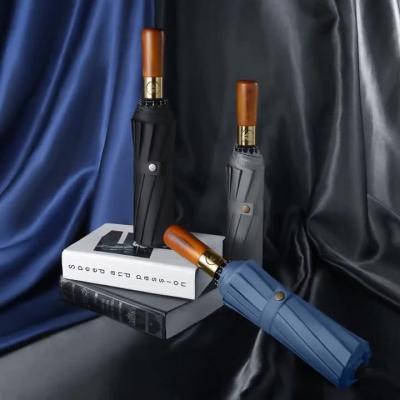 China Houten handvat paraplu 12 ribben Winddicht Waterdicht Couture Patroon voor zakelijk cadeau Te koop