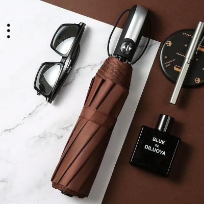 Cina Logo personalizzato stampato triplo piegatura ombrello automatico anti-UV impermeabile colore personalizzato in vendita