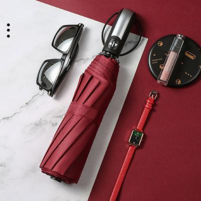Cina Logo personalizzato stampato triplo piegatura ombrello automatico anti-UV impermeabile colore personalizzato in vendita