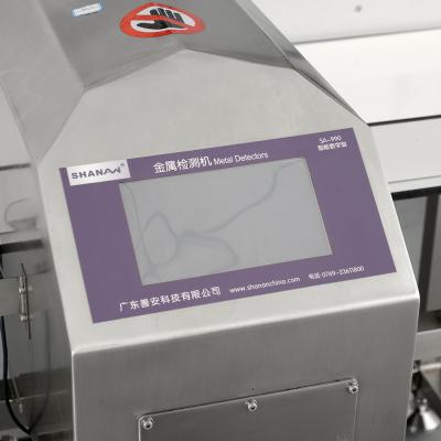 China Dimensão personalizada detector de metais de alimentos para linha de processamento de alimentos 25kg capacidade à venda