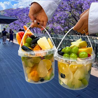 China Boîtier en plastique transparent jetable de 1000 ml Portable Fruit Juice de citronnée Tasse poignée Couvercle Bulle Tea Party Boissons Grande capacité for sale