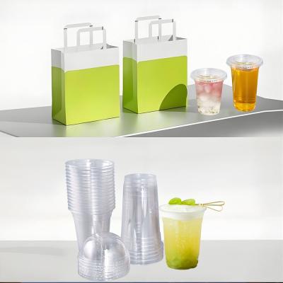 Cina Tazze trasparenti usa e getta con logo personalizzato Lesense con coperchio per bevande fredde, tè al latte, soda, tazze di plastica in materiale PET in vendita