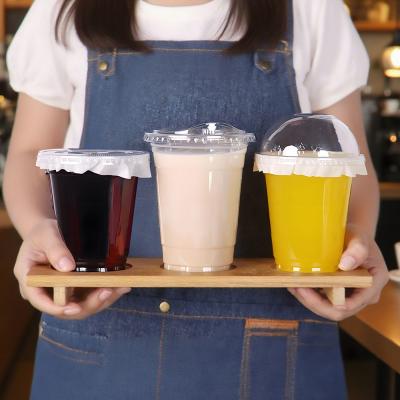 Cina Tazze trasparenti usa e getta con logo personalizzato Lesense con coperchio per bevande fredde, tè al latte, soda, tazze di plastica in materiale PET in vendita