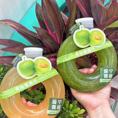China Round Shaped Beverage Bottle Customized Printed logo 16oz 500ml Juice PP Donut Bottle with Ring Lid for sale