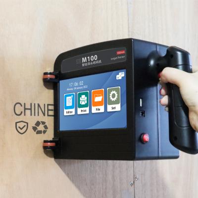 China 10cm Large Format Printer for Carton Sign Text Brand LOGO Printing Handheld Inkjet Printer for Plank Test Batch Number Print for sale