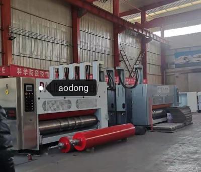 Cina 4 colore Flexo che stampa scanalando macchina tagliante una garanzia da 2 anni in vendita