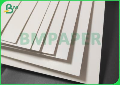 중국 215 - 350 GSM 하이벌크 GC1 보드 식품 안전한 일 측은 백색을 코팅했습니다 판매용