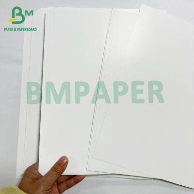 China 55lb Customizable Glossy or Matte Coated White Plain C2S Paper for sale
