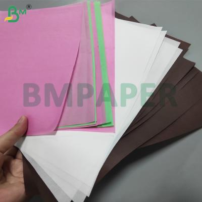 China 38gsm 40gsm Easy Slip Greaseproof Paper For Cup Caking Making Non - Stick for sale