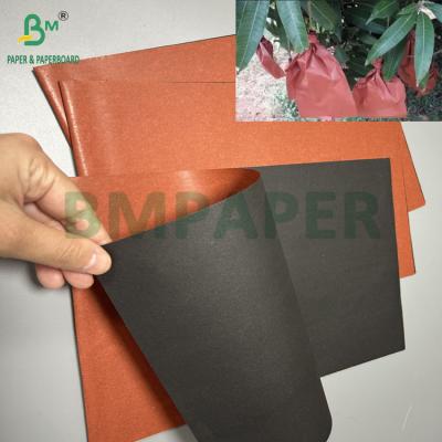 China 56gsm Waxed Coating Red Fruit Bagging Paper For Fruit Growing 90cm 100cm for sale