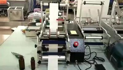 China Hot Sale Semi Automatic Round Bottle Labeling Machine Width 10-180mm Length 15-376mm for sale