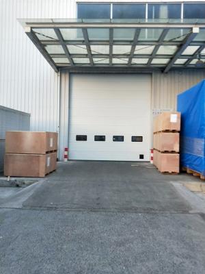 China Customized  Remote control Vertical High Aluminum Sectioanl Overhead Garage Door for sale