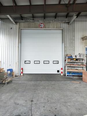 China Industrial Automatic Overhead Steel Insulated Vertical Lifting Sliding Roll up Metal Sectional Garage Door for sale