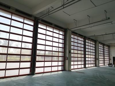 China Industrial sectional vertical lift overhead garage doors industrial lifting door for sale