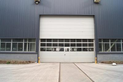 China Commercial Overhead Customized Automatic Sectional Garage Door for sale