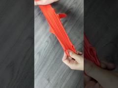 Colore arancio verde di porpora resistente sintetica del nitrile del guanto eliminabile del nitrile