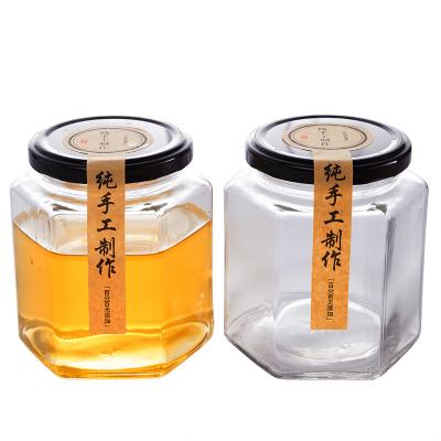 China 280ml Clear Hexagonal Shape Glass Jam Jar With Screw Top Lid Machine Made for sale