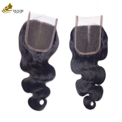Cina 130 Densità Capelli Umani Chiusura a merletti Corpo nero naturale 4x4 in vendita
