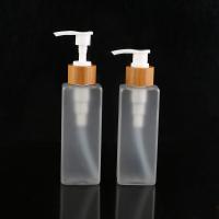 China Frosted Clear Screw Plastic Lotion Bottles With Bamboo Pump Shell for sale