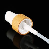 China Clear Lid Cosmetic Lotion Pump With Bamboo Pump Shell for sale