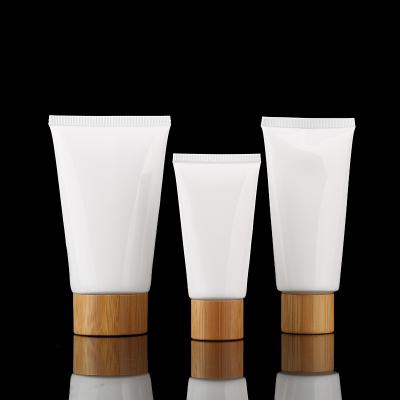 中国 卸売 30ml のプラスチック製の空の柔らかい化粧管, 60ml のプラスチック製の白クリーム製の管,竹のキャップ,空のPET製の柔らかい管 販売のため