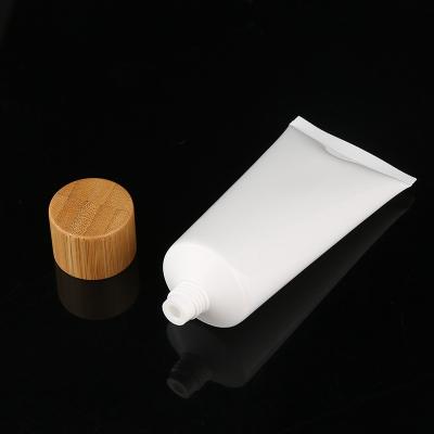 中国 卸売 30ml のプラスチック製の空の柔らかい化粧管, 60ml のプラスチック製の白クリーム製の管,竹のキャップ,空のPET製の柔らかい管 販売のため