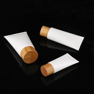 中国 卸売 30ml のプラスチック製の空の柔らかい化粧管, 60ml のプラスチック製の白クリーム製の管,竹のキャップ,空のPET製の柔らかい管 販売のため